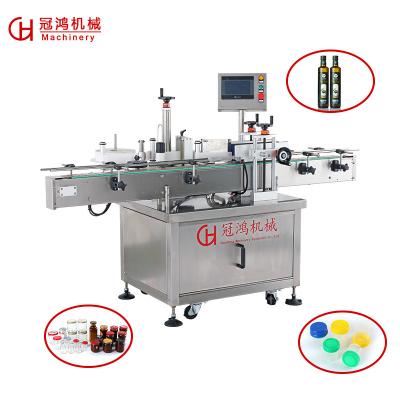 China Máquina de rotulagem de adesivos de posicionamento vertical para garrafas redondas de licor/cerveja/vinho à venda