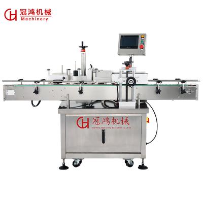 China Máquina de rotulagem de adesivos de posicionamento vertical para garrafas redondas de licor/cerveja/vinho à venda