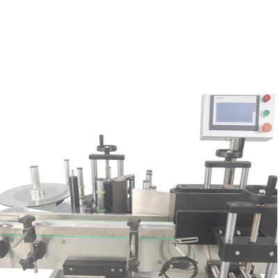 China Máquina de rotulagem de adesivos de posicionamento vertical para garrafas redondas de licor/cerveja/vinho à venda