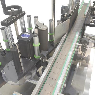 China Máquina de rotulagem de adesivos de posicionamento vertical para garrafas redondas de licor/cerveja/vinho à venda