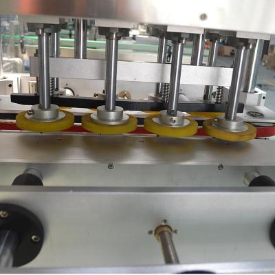 Cina Macchine per riempire e coprire bottiglie di imballaggi metallici con controllo video in uscita in vendita