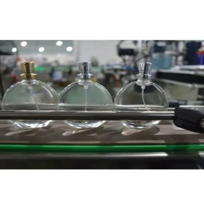 Cina Macchina di riempimento automatico di liquidi per la linea di riempimento e copertura di bottiglie di vetro in vendita