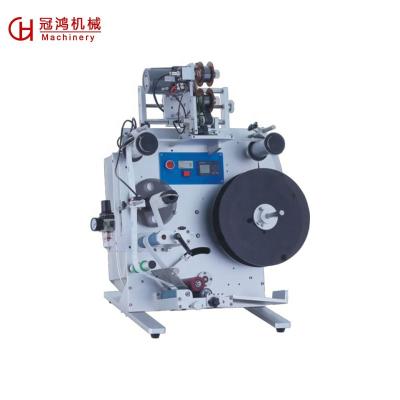 中国 ペットボトル用の電気駆動の丸いボトルラベル付け機 76mmロール直径 販売のため