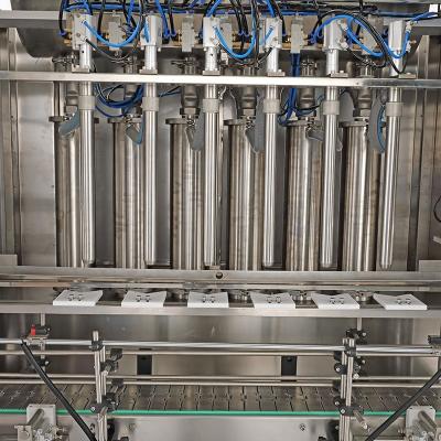 China Material de enchimento Outra máquina automática de enchimento de xarope para embalagens de frascos líquidos à venda