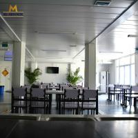 China Flat Pack Steel Structure Sandwich Panel Container House Cafeteria 25 Year Lifespan for sale