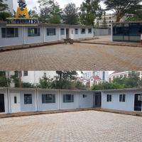 China Movable Fireproof Portable Construction Office Container House 2480mm Height Steel Structure for sale