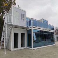 China Flat Pack Prefab Modular Office Container House 50mm EPS Glass Wall 3 Layer Stackable for sale