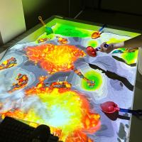 China Interactive Sand Table Beach Projection Video Game Projector for sale