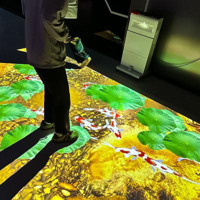 China Mobile All-in-one Interactive Floor Projector with 4000 Lumens Brightness 1280*800 Resolution and 80+ Games for sale
