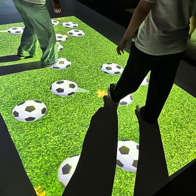 China Portable High Brightness Interactive Floor Projection Machine with 4000 Lumens and 80+ Games for Indoor Commercial Use for sale