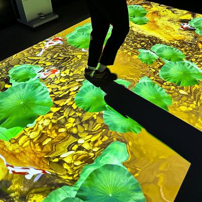 China Portable High Brightness Interactive Floor Projection Machine with 4000 Lumens and 80+ Games for Indoor Commercial Use for sale