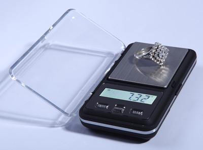 China mini escala digital 0.01g do bolso posta por 1 bateria de x CR2032 à venda