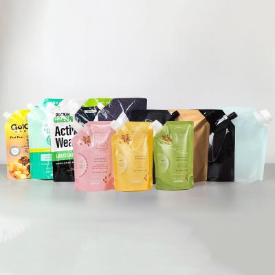 China Drink Pouches with Spout Versatile Beverage Bags Manufacturer Waterproof Nozzle  Bag Water Leakage Can Stand Packaging Bag for sale