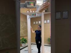 Temperature measurement walk through metal detector