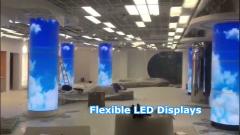 A cylindrical LED display with wraparound lighting reshapes the spatial atmosphere, showcasing high-