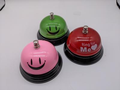 Cina Servi i tuoi clienti in modo efficiente con la campana di chiamata di metallo sorridente 85mm * 60mm 120g in vendita