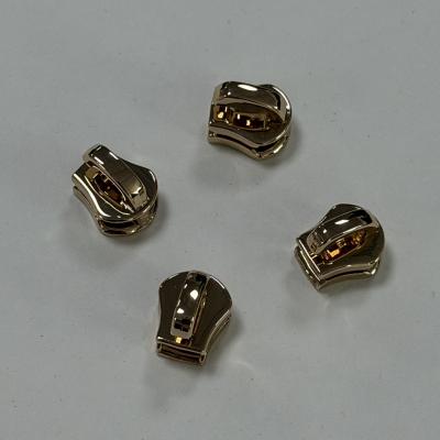 China Anti Scratch #5 Metal Zipper Slider Replacement Non Lock Pin Lock Slider Round Edge for sale