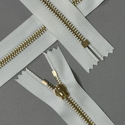 China Explosion Resistant #5 Metal Close End Zipper Shiny Gold Salt Spray Resistance for sale