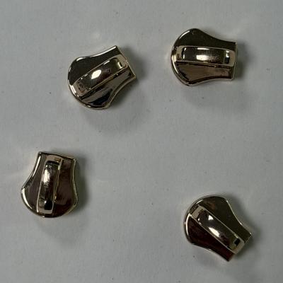 China Metal Size 5 Zipper Slider Durable Non Lock Pin Lock Slider Corrosion Resistant for sale