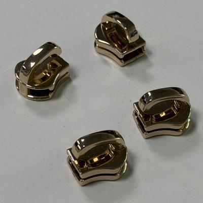 China Thick Sturdy No 8 Zipper Slider Light Gold Metal Zipper Non Lock Pin Lock Slider for sale