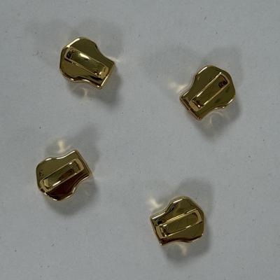 China Compact Metal Size 3 Zipper Slider Real Gold Non Lock Pin Lock Slider for sale