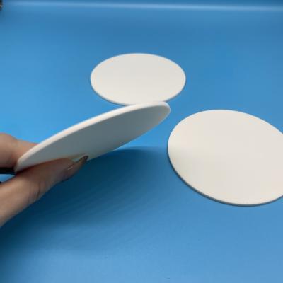 China Alumina Ceramic Insulating Disc – High Dielectric Strength Round Spacer for Power Electronics, Semiconductor & RF Applications for sale