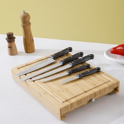 Cina 37*27*5cm Tavola da taglio in bambù con coltello con logo personalizzato per cucina moderna in vendita