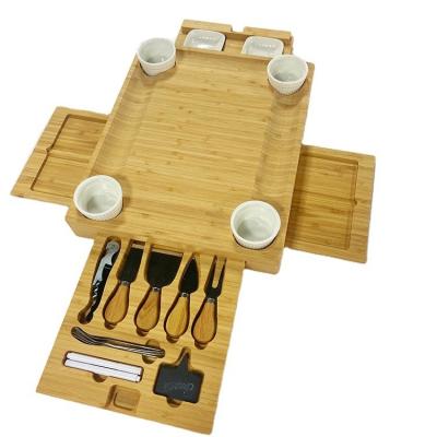 Cina Tabella di taglio per cucina in bambù naturale con coltelli e cassetti multifunzionali in vendita