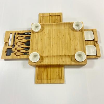 Cina Tabella di taglio per cucina in bambù naturale con coltelli e cassetti multifunzionali in vendita