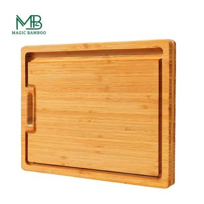Cina 43.7x32x1.5cm Tavola da taglio in bambù grande con slot di succo semplice e sostenibile in vendita