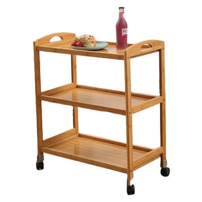 Cina Logo diretto personalizzato 3 Tiers Island Cart per hotel con materiale di bambù e ruote in vendita