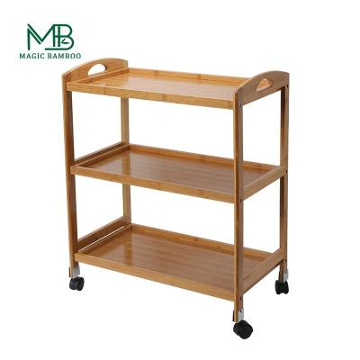 Cina Logo diretto personalizzato 3 Tiers Island Cart per hotel con materiale di bambù e ruote in vendita