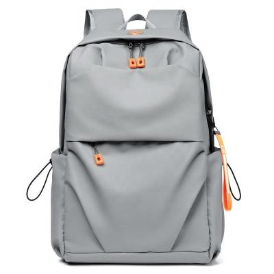 China Grey Waterproof Travel Laptop Backpack Anti Theft Backpack With Usb Charging Port for sale