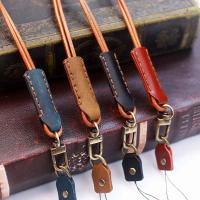 China Adjustable Leather Phone Lanyard Strap with Metal Patch Universal 45cm Neck Strap for sale