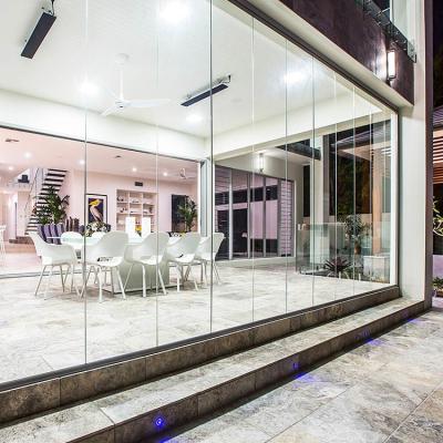 China Frameless Bi Folding Double Glazing Door Retractable Glass Patio Door for sale