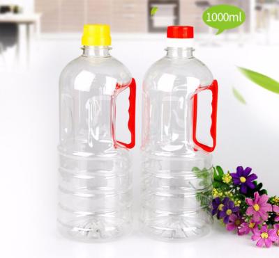 China Bottiglia di plastica della salsa di soia dell'olio da tavola dell'ANIMALE DOMESTICO con il ODM dell'OEM della maniglia for sale