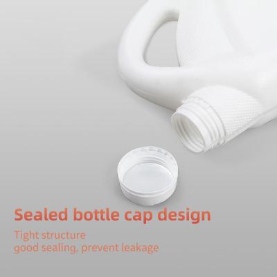 Cina bottiglie di olio del motore dell'HDPE di 1500ml 2000ml con la scatola metallica dell'olio per motori dei coperchi in vendita