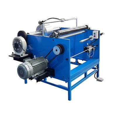Cina Materiale grezzo Macchina di rimbocco manuale per carta da imbottire di cioccolato per rulli di foglio di alluminio in vendita