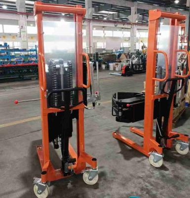 China Certificado CE 250kg 300kg 500kg 1,6 metros Empilador manual de rollos con pinza y rotador en venta