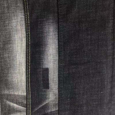 China Black Color Slub Denim Fabric 10.5oz Jeans Cloth Material For Men for sale