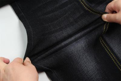 중국 11 Oz Warp Slub Black Denim Fabric For Man High Stretch Jeans 인도 시장 스타일 뜨거운 판매 판매용