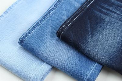 Cina 10 Una volta Dobby cotone poliestere spandex stretchy jacquard denim tessuto per jeans in vendita