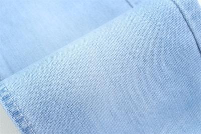 Cina 10 Una volta Dobby cotone poliestere spandex stretchy jacquard denim tessuto per jeans in vendita