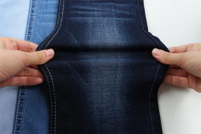 Cina 10 Una volta Dobby cotone poliestere spandex stretchy jacquard denim tessuto per jeans in vendita