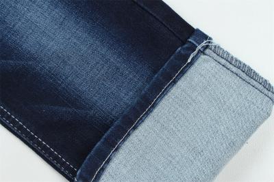 Cina 10 Una volta Dobby cotone poliestere spandex stretchy jacquard denim tessuto per jeans in vendita