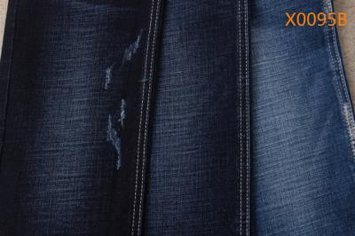 Cina i lati 11oz due ritorcono facilmente 21,6% il tessuto del denim dell'elastam del cotone del rayon 74% del poliestere 2,4% in vendita