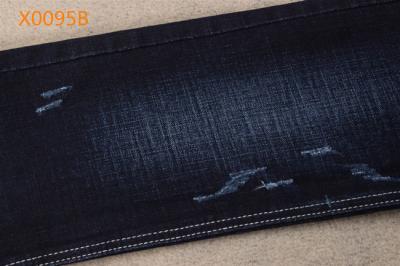 Cina i lati 11oz due ritorcono facilmente 21,6% il tessuto del denim dell'elastam del cotone del rayon 74% del poliestere 2,4% in vendita