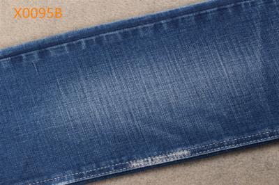 Cina i lati 11oz due ritorcono facilmente 21,6% il tessuto del denim dell'elastam del cotone del rayon 74% del poliestere 2,4% in vendita