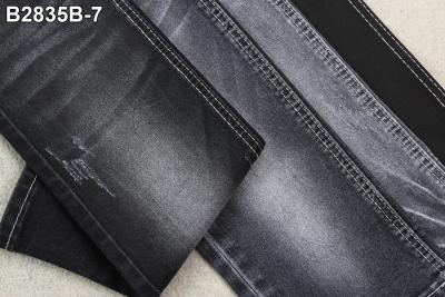 中国 62/63"衣服のための軽い粗紡糸の黒のデニムのジーンズの生地10.5oz 販売のため