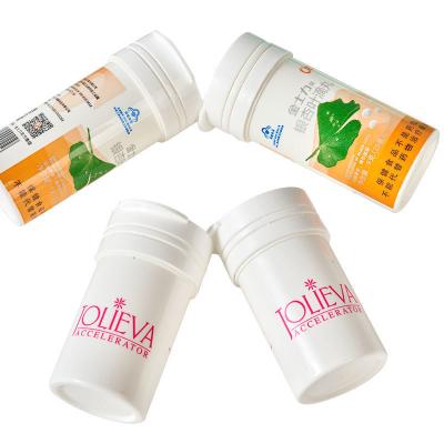 China Tubos de comprimidos efervescentes de PP branco com rolha de dessicante para embalagens de pílulas de vitaminas à venda